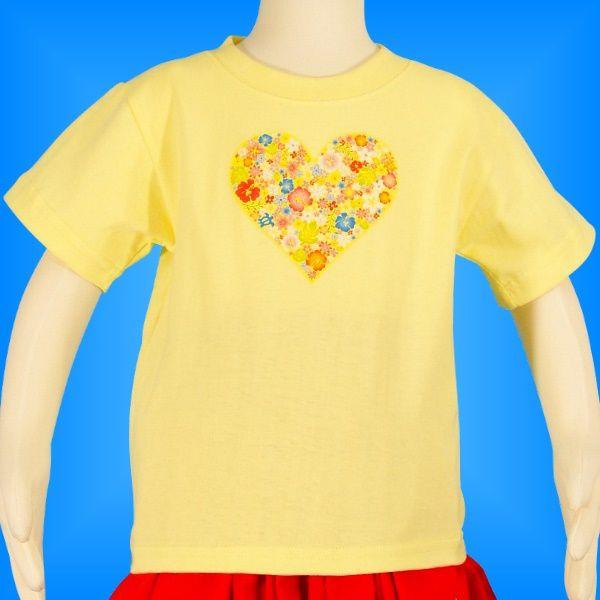 かわいいフラガールとハイビスカスを胸元にプリント。バックにはハイビスカスのプリントでフラケイキのTシャツはパウスカートにもコーディネートしやすく、普段使いもできます。身丈：42cm実寸：バスト64cm／ ウエスト69cm 素材：綿100%※...