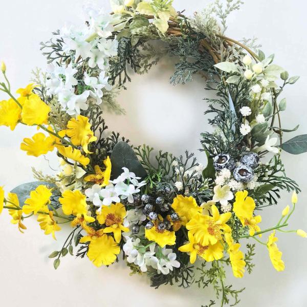 夏色リース オンシジウムでアレンジしたハンドメイドリース   　夏のディスプレイ装飾トロピカルなオンシジウムのデザインリースです。● 直径 が約23cmです。使用部材 : アーティフィシャルフラワー／フェイクグリーン・・・・・・・● 消費税...