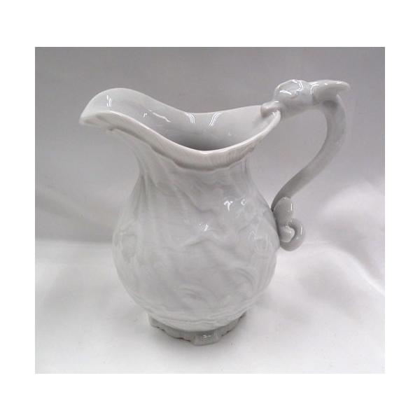　マイセン磁器、スワンシリーズ白磁のクリーマーＭ（000001-05763/約0.2Ｌ、高さ約11ｃｍ）、新品。向かい合う2羽の白鳥と1羽の鷺のレリーフ、ロカイユの文様が美しいクリーマー、ハンドルはドルフィン、大変洒落たつくりです。裏にマイ...