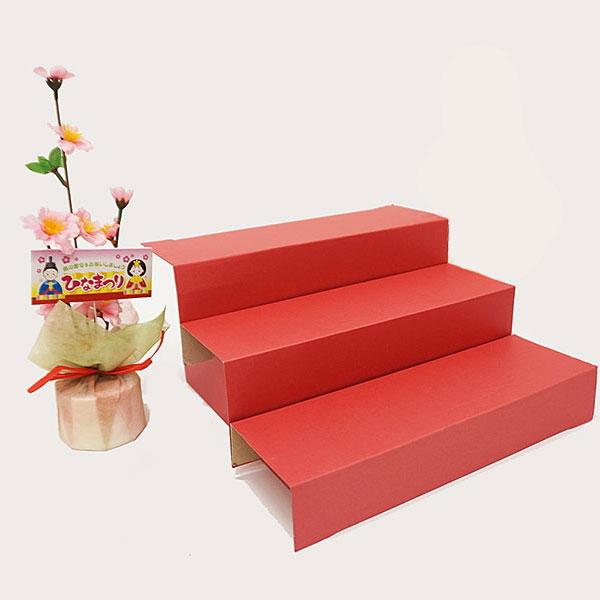 ひな祭り店舗装飾　紙製ひな段ディスプレイ台と桃ラッピングポットのセット【商品番号】 No.5256【商品説明】 ひなまつりコーナーはひな壇ディスプレイで雰囲気アップ！桃のポットとセットなのですぐにひなまつりを演出出来ます【大きさ】 ディスプ...
