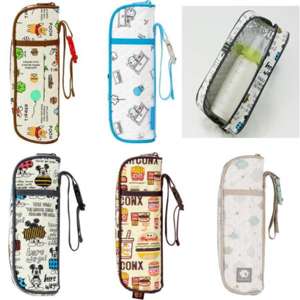 ベビーカーなどに簡単に取り付けできるバックル付きの持ち手で、開口部が大きいサイドオープン仕様です。<br>240mlまでのほ乳瓶が入ります。<br>形状によっては入らない場合がございます。<br>内側はア...