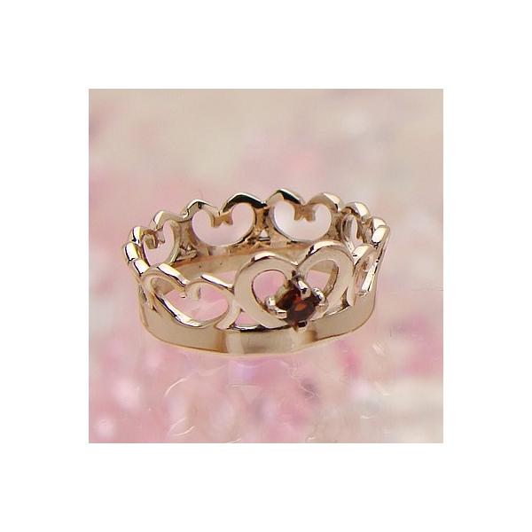 ハート型ティアラをモチーフにしたベビーリングです。当店販売の「ティアラベビーリング（別商品）」よりちょっと大きめです！■材質：K10PG（ピンクゴールド）■宝石：ガーネット（1月の誕生石/天然宝石）■サイズ：縦約6mm×横約13.5mm×内...