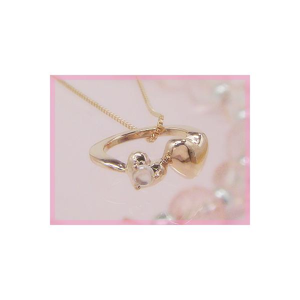 ふたつのカワイらしいハートが寄り添ったベビーリング■誕生石：ムーンストーン（6月の誕生石）■刻印できる文字数：16文字×両面（合計32文字）■刻印できる文字：英数字（大文字）「＆」「スペース」「：」「.」■リング：K10ピンクゴールド/直径...