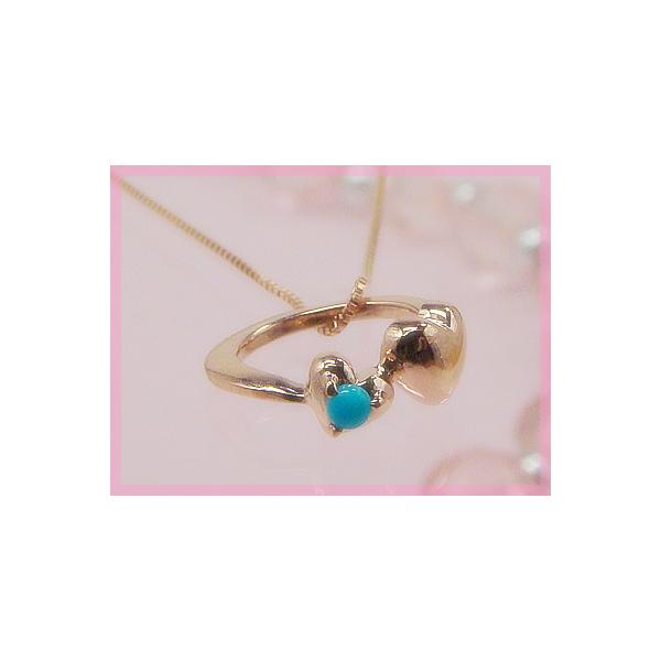 ふたつのカワイらしいハートが寄り添ったベビーリング■誕生石：ターコイズ（12月の誕生石）■刻印できる文字数：16文字×両面（合計32文字）■刻印できる文字：英数字（大文字）「＆」「スペース」「：」「.」■リング：K10ピンクゴールド/直径1...