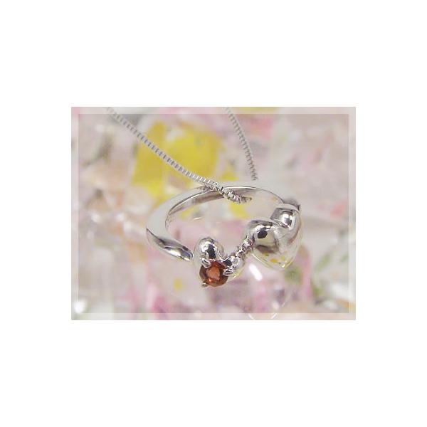 ふたつのカワイらしいハートが寄り添ったベビーリング■誕生石：ガーネット（1月の誕生石）■刻印できる文字数：16文字×両面（合計32文字）■刻印できる文字：英数字（大文字）「＆」「スペース」「：」「.」■リング：K10ホワイトゴールド/直径1...
