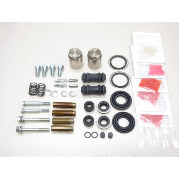 純正 新品 AE86 リア ブレーキ キャリパー オーバーホール セットこちらはピストン付のセットです。シールキット以外すべて純正品です。内容品シールキットX1サイドブレーキ用ストラットピンX2サイドブレーキ用スプリングX2スライドピン2種...