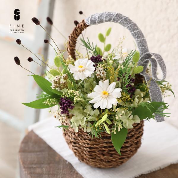 イギリスの片田舎、緑豊かな情景を想像しながらアレンジした、ナチュラルフラワーバスケット「ハンナ」。風が通り抜けるようなエアリー感が魅力的。お誕生日、結婚祝い、新築祝い、開店・開業祝いなどのギフトにも。サイズ 高さ 約22cm × 横幅 約2...