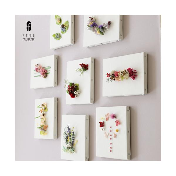 プリザーブドフラワーでキャンバスに描く。いつものアレンジメントとは違った小さな世界観は、まるで絵本のように、自由な表現を生み出しました。[ 商品詳細 ]大きさ　キャンバス 約14×18cm H約2cm、クリアケース　約14×18cm H7c...