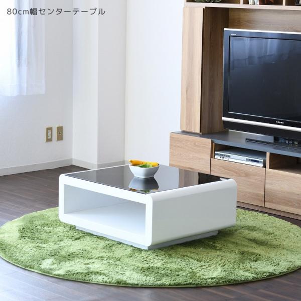 ユニークな構造でモダンなデザインのセンターテーブル、天板下は収納スペースとしてお使いいただけます。天板は美しい鏡面のブラックガラスを使用、お部屋で映える高級感あふれるデザイン。[80センターテーブル]■サイズ幅80cm×奥行70cm×高さ3...