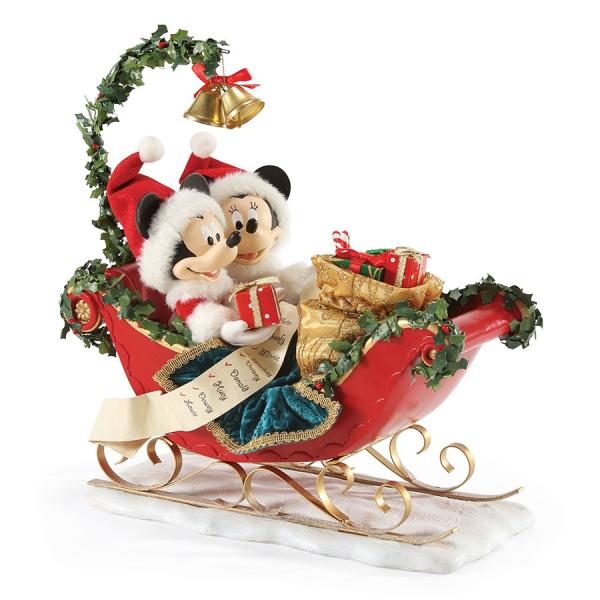 ミッキーとミニーが、素敵な友人たちにクリスマスプレゼントを渡しに向かっているシーンをイメージした置物です。膝に毛布を掛けて寒さ対策もバッチリです。生産地 中国サイズ 幅24cm×高29cm×奥12.3cm素材 ポリレジン製
