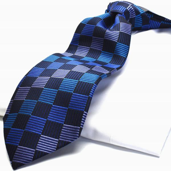 サイズ縦143センチ×幅8〜8.5センチ材　質シルク１００％色ネイビーベースにブルーのブロックチェック商品説明写真と多少の色の異なりはご了承下さい。 ポイント利用