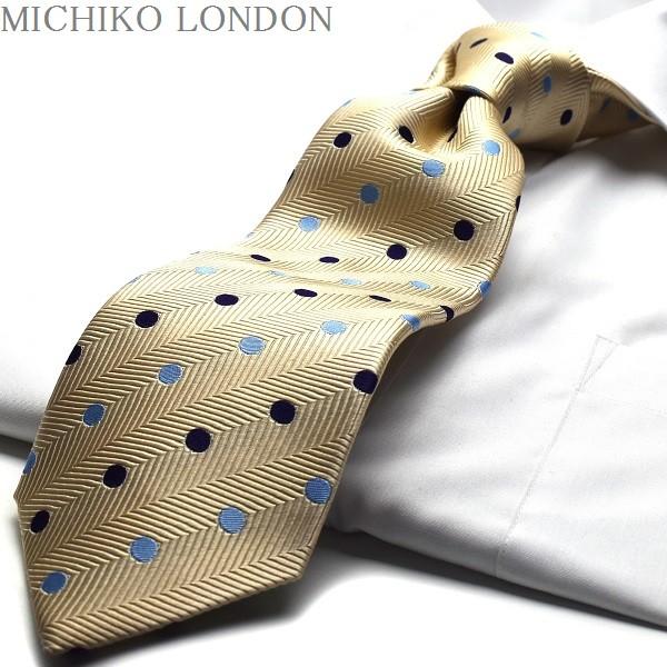 【20代/30代/40代/50代/60代】サイズ縦143センチ×幅8センチ材　質シルク１００％色 ゴールドヘリンボーンベースに水色、ネイビーのドット柄生産国日本製商品説明写真と多少の色の異なりはご了承下さい。 ポイント利用