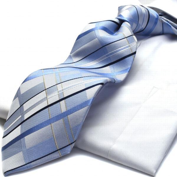 サイズ縦143〜146センチ×幅8〜8.5センチ材　質シルク１００％色水色ベースにホワイト、ブラック、ゴールドのチェック商品説明写真と多少の色の異なりはご了承下さい。