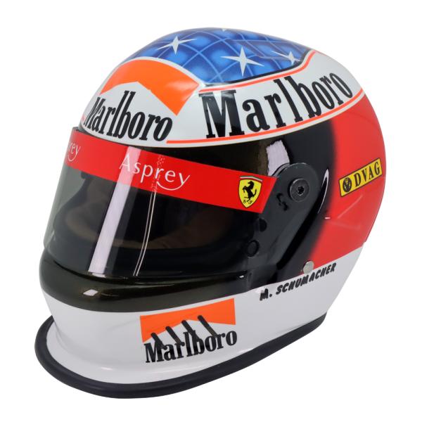 サイズ：1/2スケール（全長 約16cm）素材：FRP / ファブリック備考：バイザー開閉可能ミハエル・シューマッハがフェラーリへ移籍した初年度の初優勝がスペインGP。シューマッハ本人は当時のチーム力からすぐさまタイトル争いに加わるのは無理...