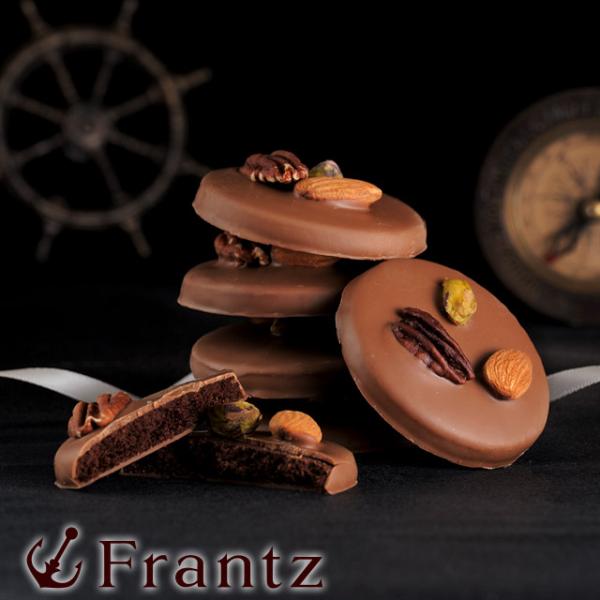 (ホワイトデー プレゼント チョコ)くちどけなめらかな濃厚ミルクチョコで、ザクザク食感の厚焼きカカオサブレを贅沢に分厚く包み込み、チョコレートと相性の良い3種のナッツ（アーモンド、ピーカンナッツ、ピスタチオ）をトッピング。■内容量マンディア...