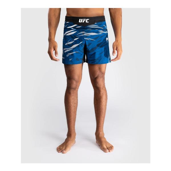 VenumよるUFCフュージョンは、洗練されたパフォーマンスファブリックと原始的なデザイン要素を融合させた、フルアパレルおよびアクセサリーのラインです。この本物のUFCファイトナイトコレクションの各アイテムは、競技するUFCアスリートのニー...