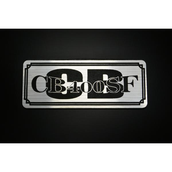 ホンダCB400SFNC31NC39NC42revoレボ【商品詳細】・サイズ： 縦：2cm×横5cm×厚み0.1cm・色： 銀/黒・個数：1枚・素材：アクリル2層ステッカー・質感 背景／地肌・・レーザー加工によるマットブラック ロゴ部・・ヘ...