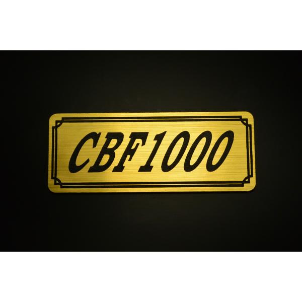 ホンダCBF1000【商品詳細】・サイズ： 縦：2cm×横5cm×厚み0.1cm・色： 金/黒・個数：1枚・素材：アクリル2層ステッカー・質感 背景／地肌・・レーザー加工によるマットブラック ロゴ部・・ヘアラインゴールド。・マットブラック部...