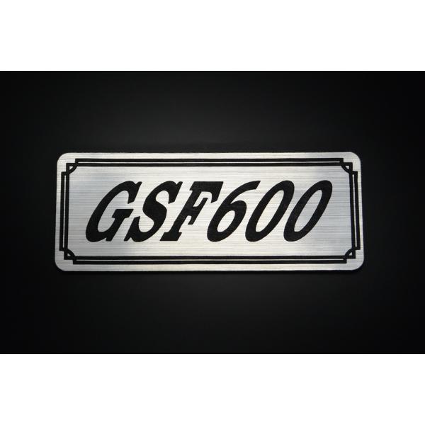スズキGSF600【商品詳細】・サイズ： 縦：2cm×横5cm×厚み0.1cm・色： 銀/黒・個数：1枚・素材：アクリル2層ステッカー・質感 背景／地肌・・レーザー加工によるマットブラック ロゴ部・・ヘアラインシルバー。・マットブラック部に...