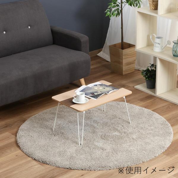 センターラインがアクセントの折りたたみローテーブルです。