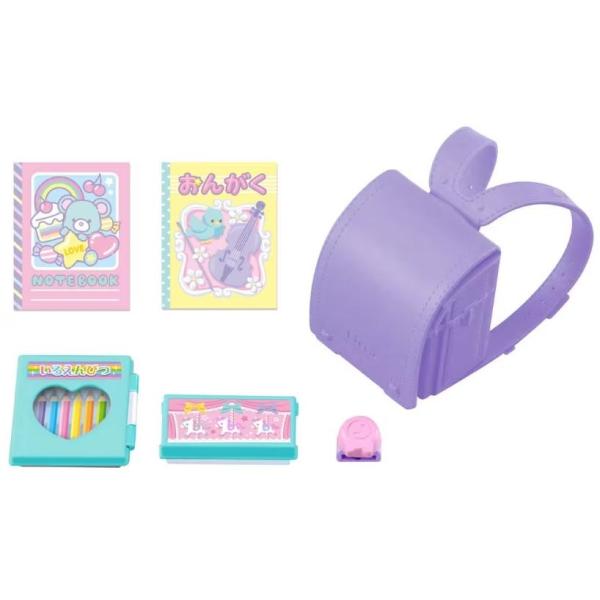 人形のランドセルセットです。人気のパープルカラーのランドセル、ふでばこ、色えんぴつ、防犯ベル、ノートがセットになっています。