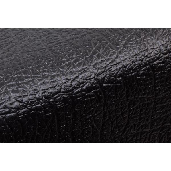 ブラック ジャングル バーク トーレックス、幅 54 インチ。このトーレックスは比較的軽量で、上部のビニール層が薄く、裏地の糸数は少ないのが特徴です。厚さは約 0.0275 インチです。ジャングル バークのパターンは、マーシャル エレファン...