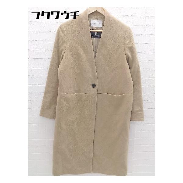 管理番号： 110202000396820220804ベースW462/日付属品： 無素材： 画像参照色： ベージュサイズ： サイズ38梱包サイズ： 梱包サイズは大サイズになります。 採寸サイズ： 着丈：約101cm　肩幅：約39cm　身幅：...