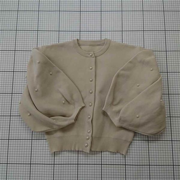 管理番号： 151111004530420260308ベースW/増付属品： 無<br>採寸はAIが1cm各の格子背景で行っております。素材： 画像参照色： ヴェリテ VERITE パール付きバルーンスリーブカーディガン ベージュ...