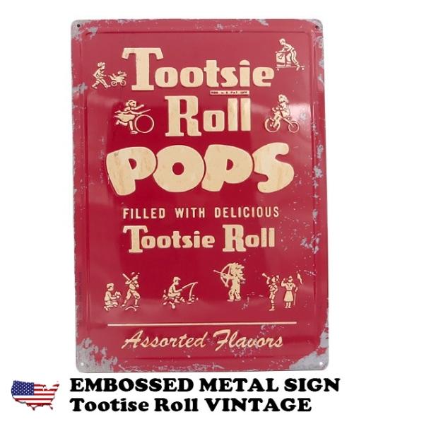アメリカ直輸入 トッツィーポップスの立体ブリキ看板TOOTSIE POPS トッツィーポップス のエンボスメタルサイン♪看板のデザインはトッツィーポップのパッケージみたいに、フィッシングや野球、スケボーしている少年少女がデザインされています...