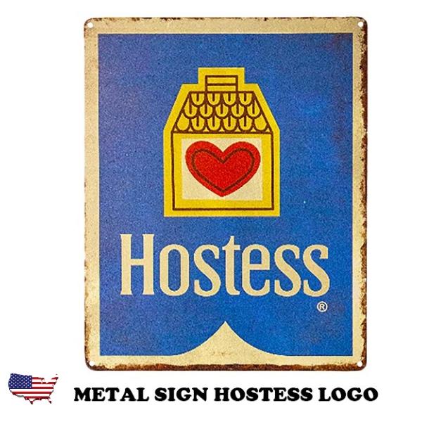 アメリカ直輸入メタルのサインプレートアメリカンなガレージ・お部屋をカッコ良く演出【ホステス 】のメタルサインプレートです♪アメリカのお菓子メーカーホステス社のヴィンテージ仕様ブリキ看板。HOSTESS / ホステスはトゥインキーやディンドン...