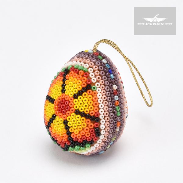 【部族】HUICHOL（ウィチョル）【品名】ORNAMENT（オーナメント）【素材】ビーズ【サイズ】横幅：33mm縦幅：41mm【商品説明】本製品はメキシコ北部の山の中に暮らすウィチョル族によって制作されたオーナメントです。ウィチョル族は独...