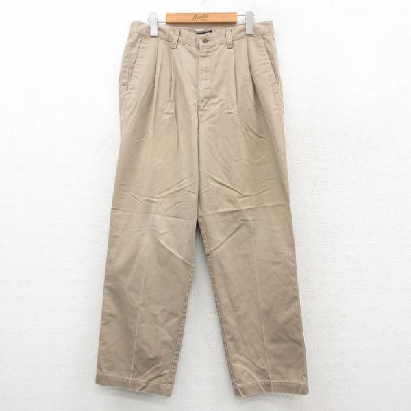 【商品番号】　par25092465【商品名】　W33★古着 ドッカーズ パンツ メンズ コットン ベージュ【表記サイズ】　W33　L30【実寸サイズ】　ウエスト（腰まわり）84cm　レングス74cm　股上（ウエストから股の付け根）31cm...