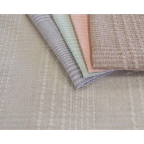 品番 ＡＳＫ−Ｃ−８０２品名  綿/麻フクレサッカー規格  108/110cm巾混率  綿77％ 麻（ラミーリネン）14%ポリエステル9％価格  １４００円/ｍ単位販売商品説明シャリ感のあるさわやかな綿麻素材。撚糸を使ったボイル生地。シアサ...