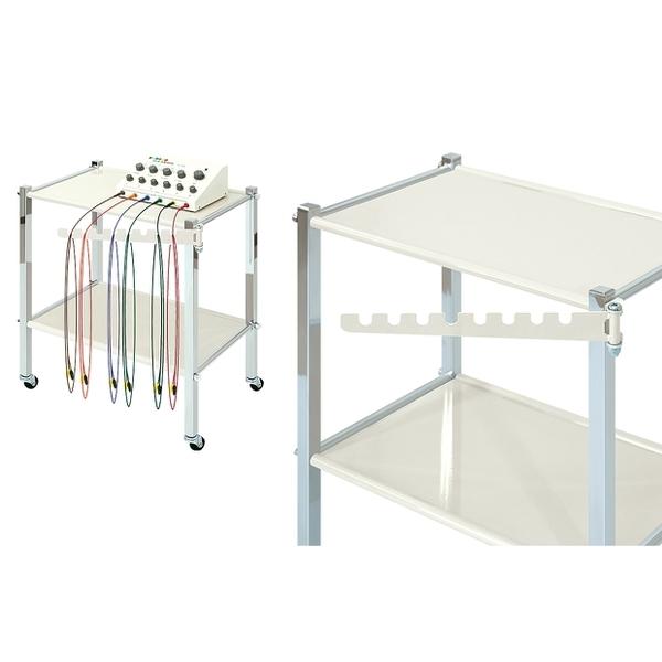 低周波治療器などの道子コードを絡ませず収納できる便利アイテム。コードの使用状況に応じて最大270°まで自由に回転することが可能。ワーゴン・ツーゴン専用後付け部品。現場での先生方の声から誕生。幅5cm、奥行35cm、厚み3cm