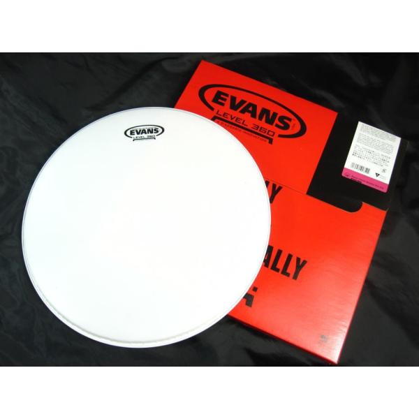 EVANSのスネアドラム打面用ヘッド。10mil、１プライのヘッド中央に5mil、5"径のパッチを装着し、中音域が豊かな太いサウンドが特徴です。独特の切れ目を入れたデザインでパッチの柔軟性が保たれ、ヘッドの振動を妨げずオープンなサウンドとレ...