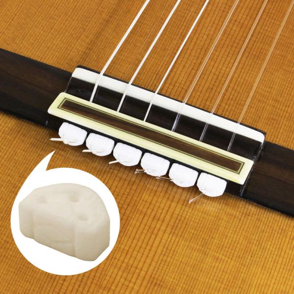 Diamond Secure Tieblock3つの穴を使い弦を固定するストリングタイ。強度は保ちながら1つ0.5gと軽量化されています。弦を張るのが簡単になり、弦の先が表板を傷つける心配も軽減。ブリッジに弦を直接留めない事で明瞭なサウンド...