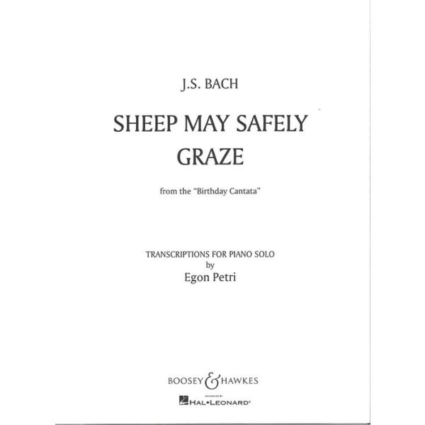 羊は安らかに草を食み