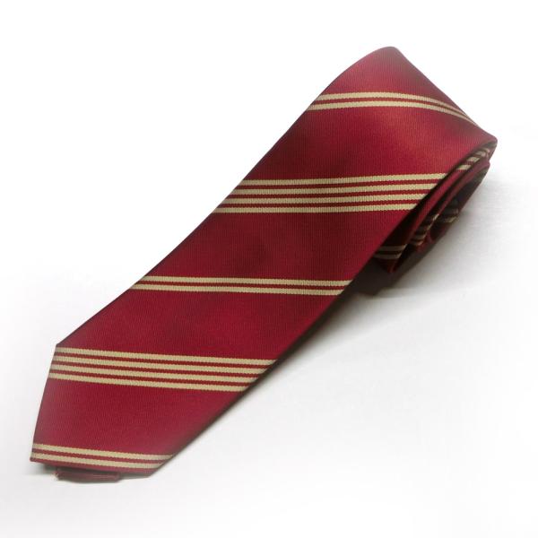 ELLE ECOLE(エルエコール)のスクールネクタイ派手すぎず華やかなエンジと金茶のストライプ柄ネクタイ女子やジュニアにおすすめです。長さ約128センチ大剣先巾7.5センチ品質：ポリエステル100％日本製※「移染」にご注意下さいシャツにつ...