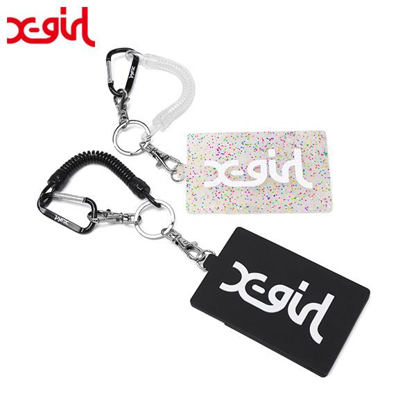 ストリートに映えるラバーパスケースX-girlのミルズロゴが目を引くラバーパスケース。シリコン素材のため、水や汚れもさっと拭き取れるのがポイントです。コイルチェーン付きでICカードのタッチもスムーズ。散らばりがちな鍵やチャームもしっかりまと...