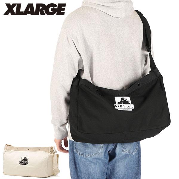 BIGデザインが◎ニュースペーパーバッグ厚手布を使用したワイドショルダーバッグ。人気のニュースペーパーバッグデザインにアイコニックなOGロゴタグの刺繍が映える仕上がりになっています。ユニセックスで使用可能で、デイリーユースはもちろん、通勤や...