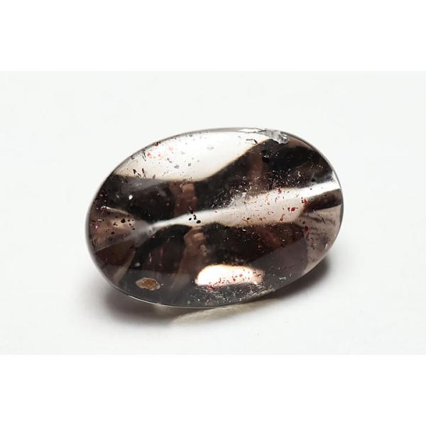 1.0×0.7×0.55cm　2.28ct　コーベライト(銅藍)を内包した水晶で、光を当てると鮮やかなピンクのレッセンスを発します。非常にレアな石で、幻想的な美しさで大変人気があります。ブラジル産。