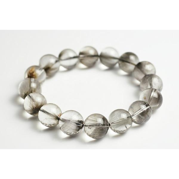 13mm×16玉手首周り約16.5cm<br>ブルッカイト(板チタン石)を内包した水晶です。ブルッカイトからプラチナ色に輝くルチルが伸びることから、プラチナクォーツと呼ばれています。<br>今回入荷分は非常に高品質で...