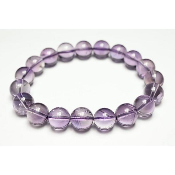 10mm玉×19個 手首周り約16.0cm　アフリカ産のファントムアメジストです。今までにないライトカラーでファントムが入っておりまして、大変、美しいアメジストです。多少のクラックは入りますが、素晴らしい透明感があり、ファントムがはっきりと...