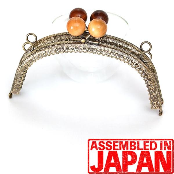 がま口バッグのハンドメイドに♪高級感あるデザインのお洒落な波型フレームです♪※木製玉は自然の木を加工した商品になりますので、節や凹み、色ムラ、色味の差、小傷や擦れなどがどうしてもございます。商品の仕様として予めご了承お願いいたします。---...