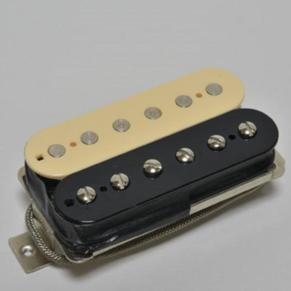 星の数ほどあるPAFコピーとは一味違う、枯れながらも艶のある出音を追求しました。イメージは、P.コゾフのレスポールのサウンド。弾き手も聞き手もピッキング・ニュアンスがはっきりと感じとれることでしょう。マグネットには、ラフキャストのアルニコ2...