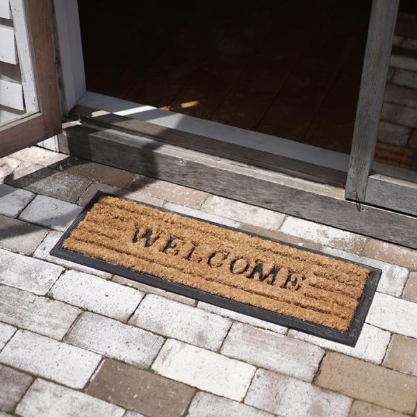 ■商品名：ドアマット WELCOME■商品コード：84300800スリムでスマートな長方形のドアマット。WELCOMEの言葉がお客様をお出迎えします。耐久性の高いココナッツファイバーがしっかり泥を落とすので、玄関前にぴったり。インテリアに取...