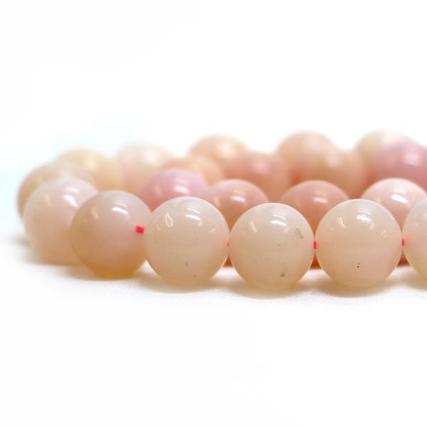 【ビーズサイズ】10mm【形】丸玉【連の長さ】約38〜40cm※ビーズサイズは0.5mm前後の誤差がある場合がございます【商品説明】ピンクオパールはオーストラリア、ペルー、メキシコなどから産出されますオパールは大きく2つに分類され、虹色に輝...