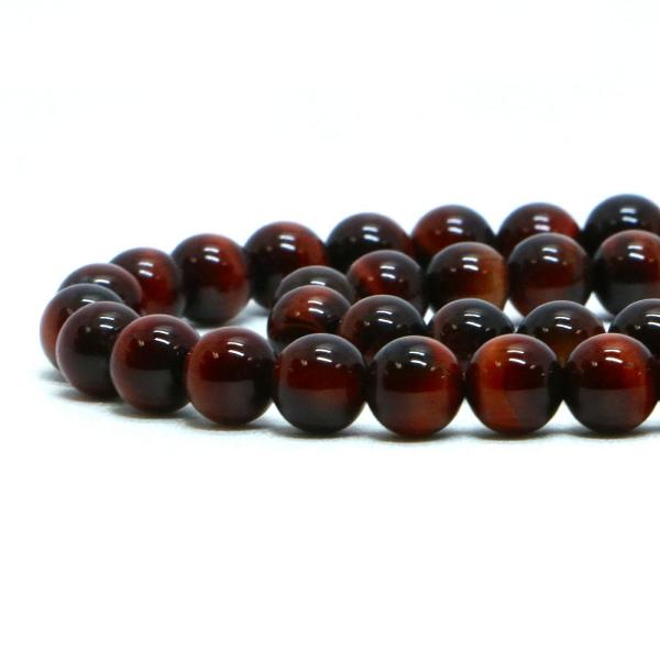 【ビーズサイズ】6mm【形】丸玉【連の長さ】約38〜40cm※ビーズサイズは0.5mm前後の誤差がある場合がございます【商品説明】和名では赤虎目石（あかとらめいし）と呼ばれます研磨されたタイガーアイの表面は光の角度によって特徴的な輝きを放ち...