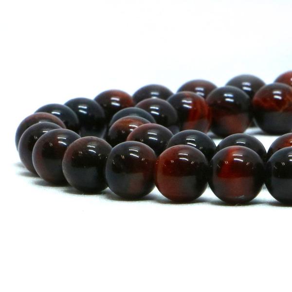 【ビーズサイズ】8mm【形】丸玉【連の長さ】約38〜40cm※ビーズサイズは0.5mm前後の誤差がある場合がございます【商品説明】和名では赤虎目石（あかとらめいし）と呼ばれます研磨されたタイガーアイの表面は光の角度によって特徴的な輝きを放ち...
