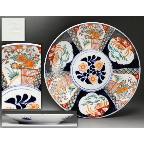 【発売日：2020年08月23日】ご覧の様な明治期に製作された伊万里色絵（山徳製）の尺三寸大皿鉢です。清潔感のある白を基調として構成されており、発色の良い色絵の花文が良く映えた作品であり、正月等、多人数が集まった際の盛り付け皿としては最適の...